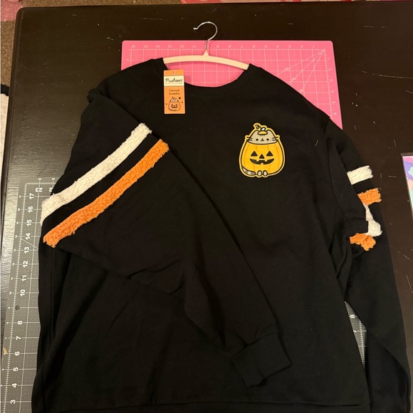 Pusheen | Tops | Pusheen Black Sweater With Orange And White Accents ...